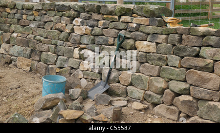 Construction of dry stone wall Stock Photo - Alamy