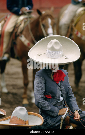 Mexican charro or cowboy on horseback in a lienzo charro (aka arena ...