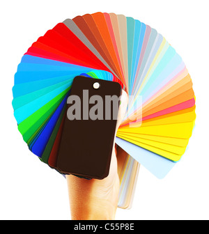 Colors range palette on hand isolated on white background. Top view ...