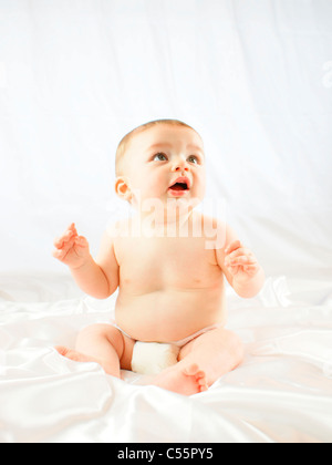 Baby boy in nappy Stock Photo - Alamy