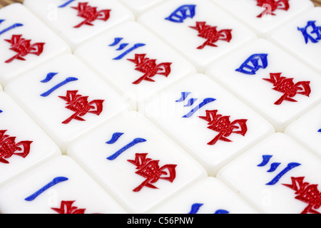 Mahjong set of character cards or tiles, arranged in a line with values ...