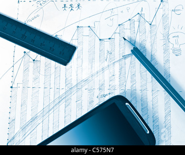 Business accessories on a background of diagrams. Copy space for text ...