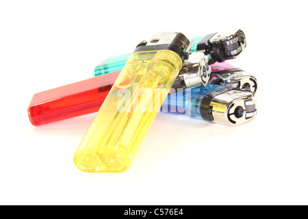 a stack of colorful lighters on white background Stock Photo - Alamy