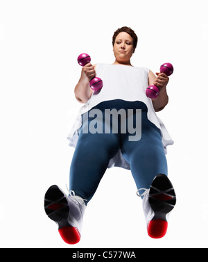Large woman lifting weights Stock Photo - Alamy