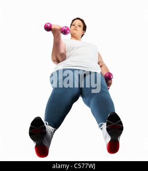 Portrait of women lifting one arm and smiling Stock Photo - Alamy
