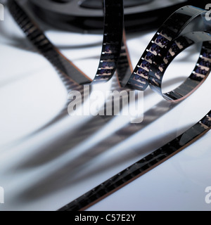 Unwinding film reel Stock Photo - Alamy