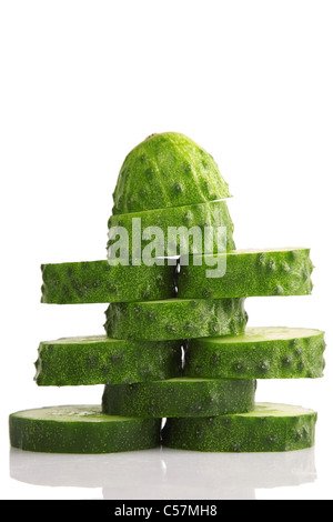 Pile of fresh cut cucumber isolated on white, top view Stock Photo - Alamy