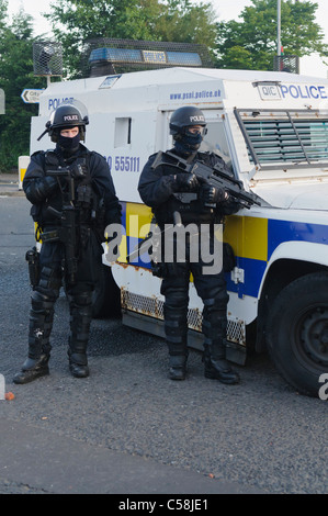 A police officer beside a bullet proof unmarked police car which was ...