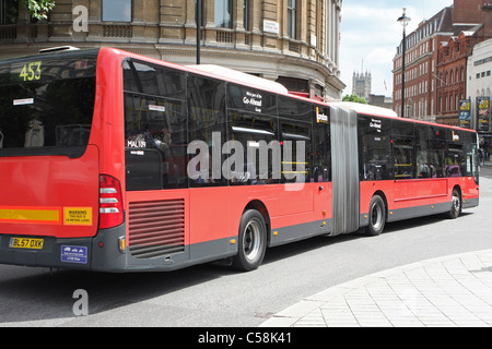 A bendy bus traveling around Trafalgar Square in London Stock Photo - Alamy