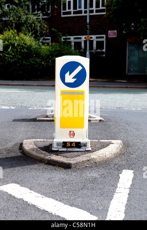 british street bollard with blue and white sign indicating separate ...