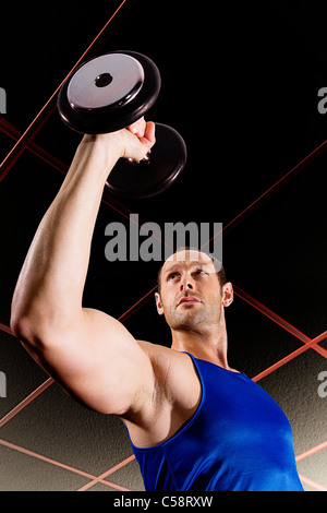 A man lifts weights in a gym in Kabul, Afghanistan, October 2004 Stock ...