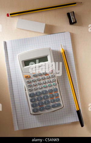 pen and calculator on the book Stock Photo - Alamy