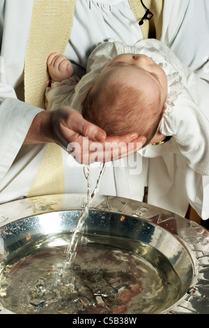Pouring Water into Baptismal Font close up Stock Photo - Alamy