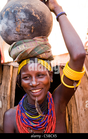 Portrait of a Dassanech / Galeb tribeswoman at a tribal village near ...