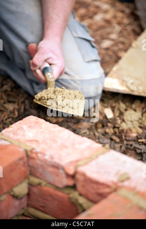 Bricklayers at work building a house Stock Photo - Alamy