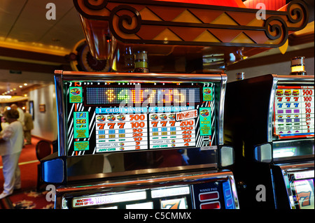 Gambling at slot machines aboard the Cruise Ship Carnival Fantasy Stock ...