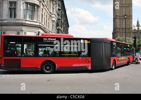 Bendy bus turning a corner in London Stock Photo - Alamy