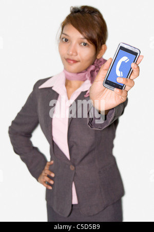 Businesswoman shows his mobile phone forward Stock Photo - Alamy