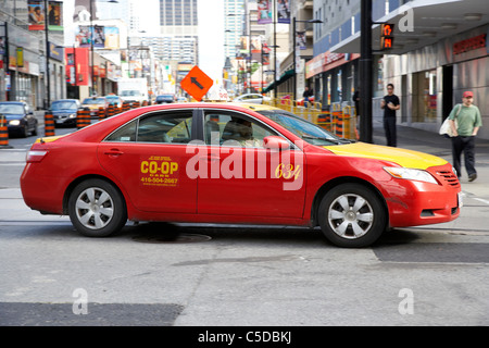 red co-op downtown cab toronto ontario canada Stock Photo - Alamy
