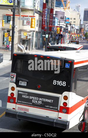 TTC (Toronto Transit Commission) street car westbound on Queen Street ...