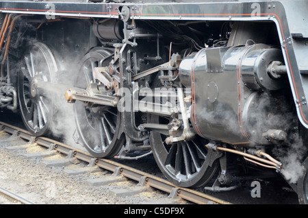 Steam locomotive valve gear wheels and connecting rods Stock Photo - Alamy
