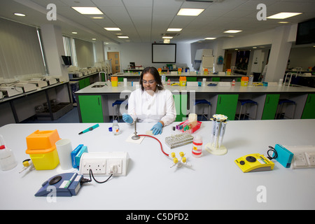 Lab technician chemical testing at the Leeds Metropolitan University ...
