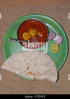 Rice Roti served with Egg Curry. A Gluten free alternative with raw ...