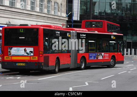 Bendy bus turning a corner in London Stock Photo - Alamy