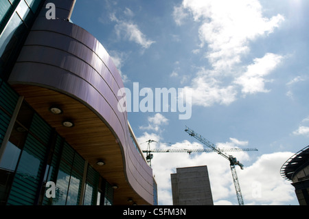 Construction cranes at work on the EICC extension, Edinburgh Stock ...