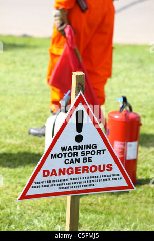 Sign warning that motorsport can be dangerous at the VSCC event at ...