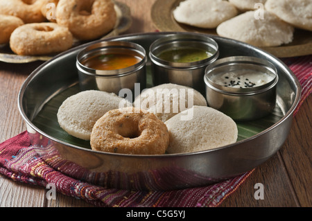 Idly wada. Steamed rice cakes and lentil fritter. South Indian ...