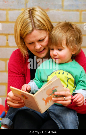 Reading children nursery rhyme story Stock Photo - Alamy