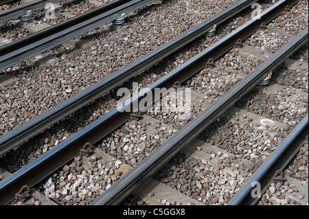 Railway tracks, showing the third rail system as used in the south of ...