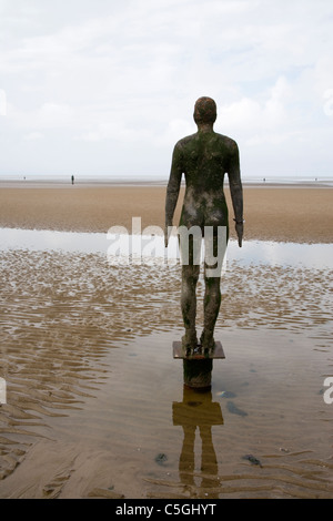 Anthony Gormley Statues on Crosby Beach, Merseyside UK Stock Photo - Alamy