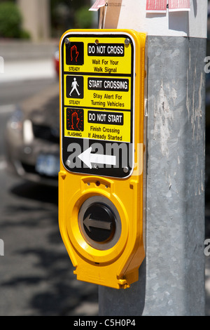 push button at pedestrian crossing crosswalk street road Winnipeg ...