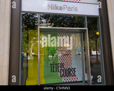 Nike Paris sign at the Nike store Champs Elysees Paris France Stock ...