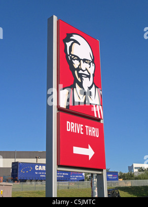 KFC drive thru restaurant sign. The Billion Dollar Chicken Shop is a ...