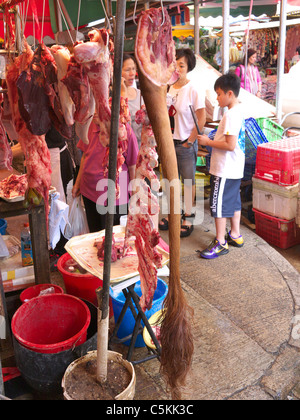 Butcher Meat seller in Hong Kong China Stock Photo - Alamy