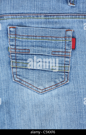 Blue worn jeans back pocket isolated on white background. Denim fashion ...