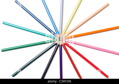 Macro of color pencils, in a star shape, isolated on white background ...