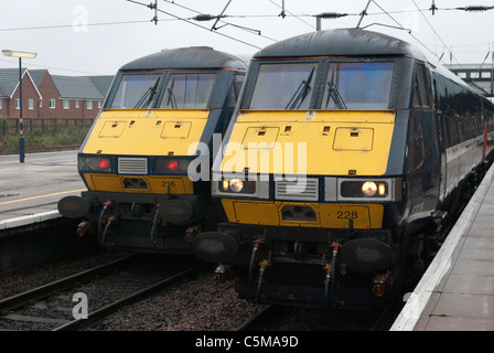 Two National Express trains at Grantham station on overcast day. East ...