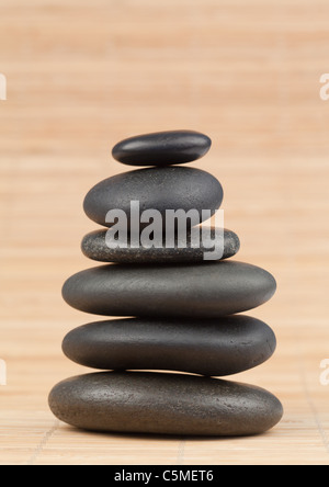 Round smooth pebbles stack close up Stock Photo - Alamy