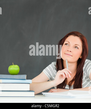 Beautiful student writing an essay Stock Photo - Alamy