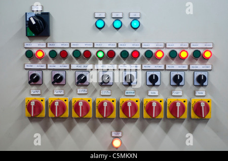 Many buttons and switches - control panel in a machine Stock Photo ...