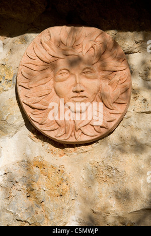 Terracotta sun design motif Rosia , Tuscany , Italy Stock Photo - Alamy