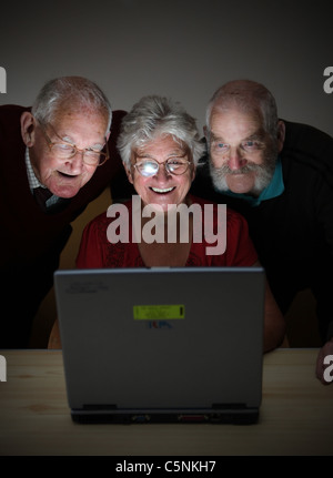 Older people with a laptop Stock Photo - Alamy