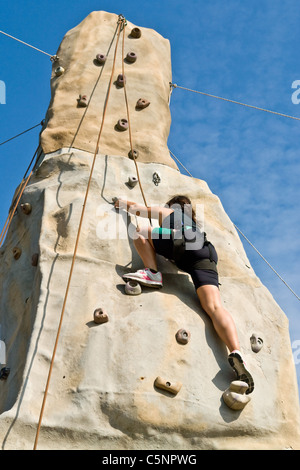 Girl climbing a rock face# Stock Photo - Alamy