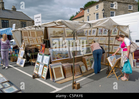 Shoppers at the weekly Friday Market in the square at Helmsley North ...