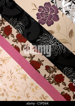 Selection Of Textured And Flock Wallpaper With Floral Patterns Stock ...