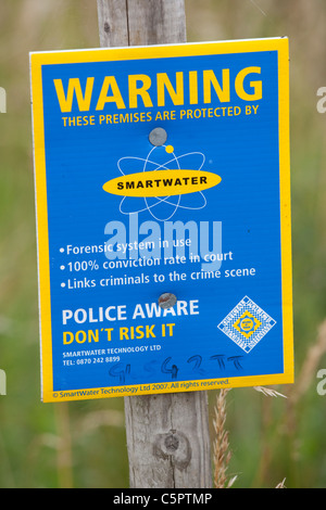 Smartwater Police aware warning sign on the church of st. Andrew in ...